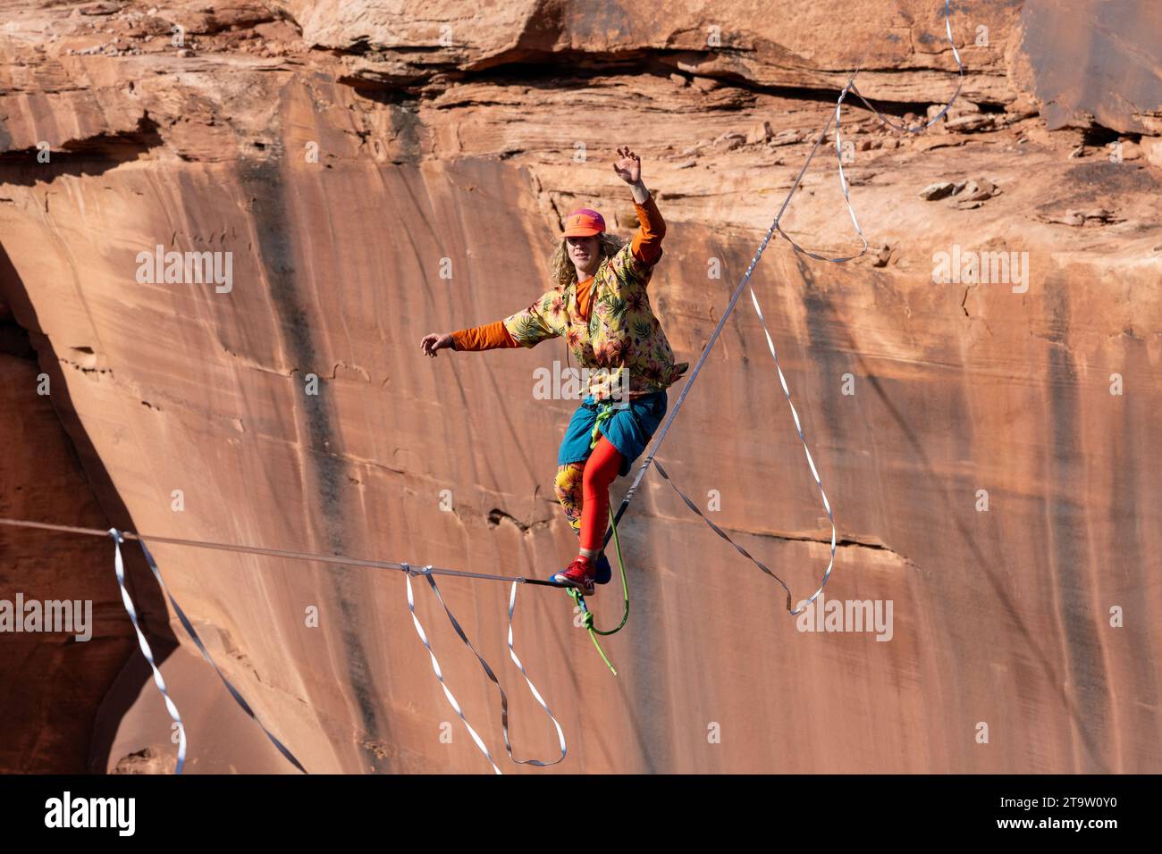 A young man walking a highline at the GGBY World Highline Festival in ...