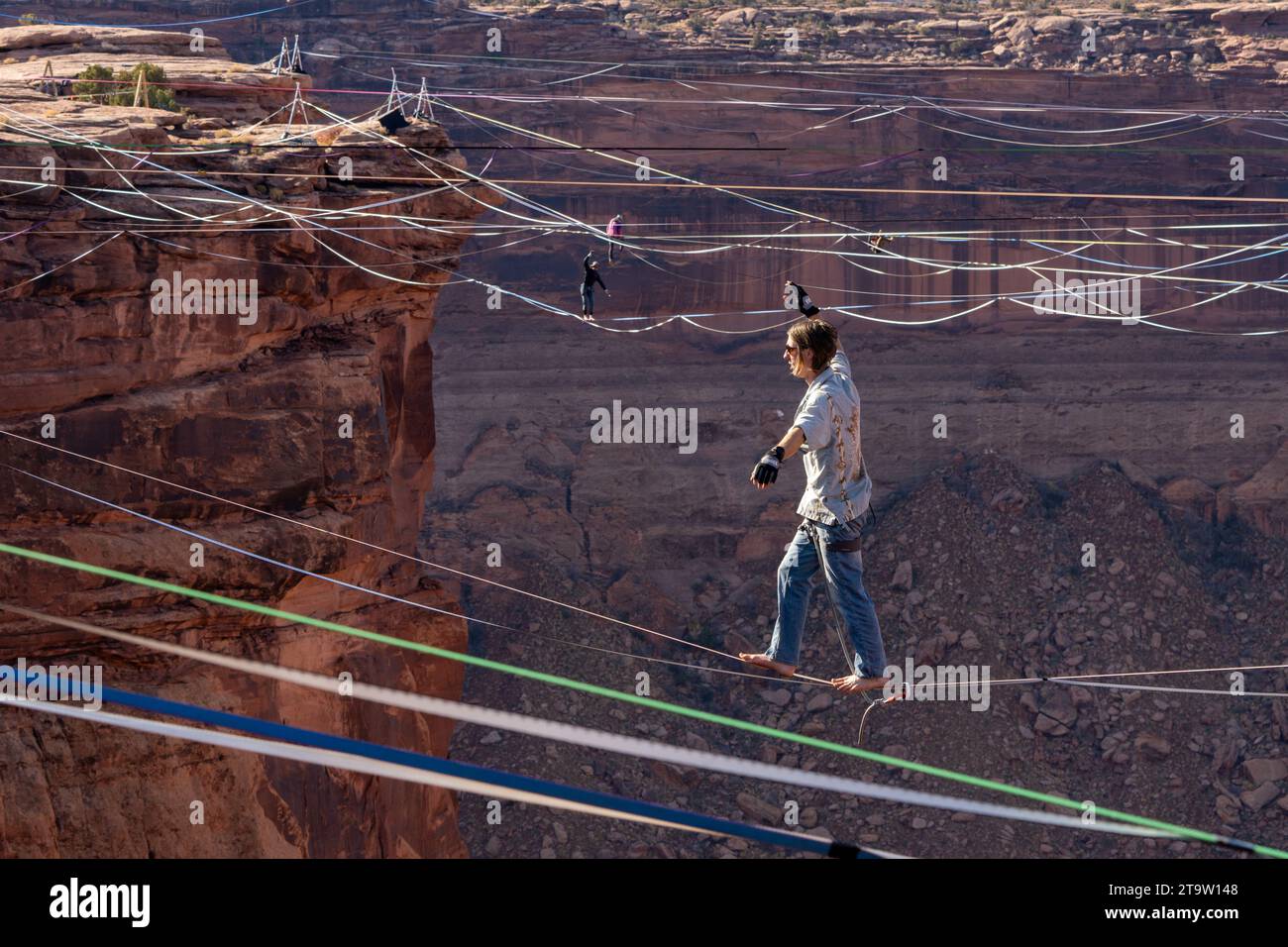 Three men on highlines at the GGBY World Highline Festival 500 feet ...