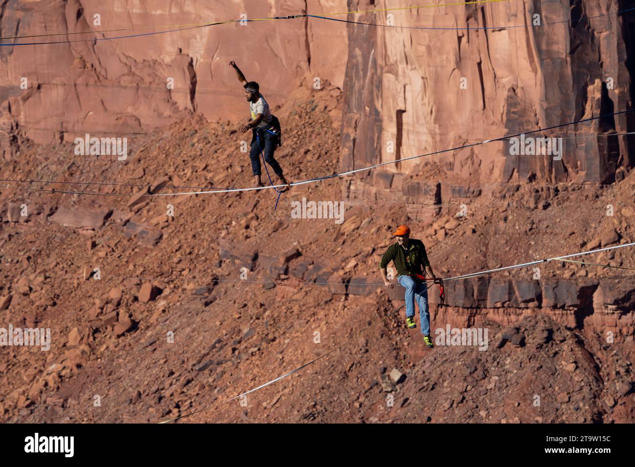 Two people on highlines at the GGBY World Highline Festival 500 feet ...