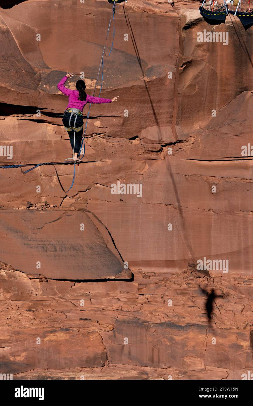 A woman on the highline with her shadow over Mineral Canyon at the GGBY ...