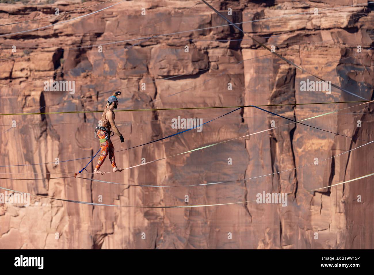 Telephoto view of a man walking a highline at the GGBY World Highline ...