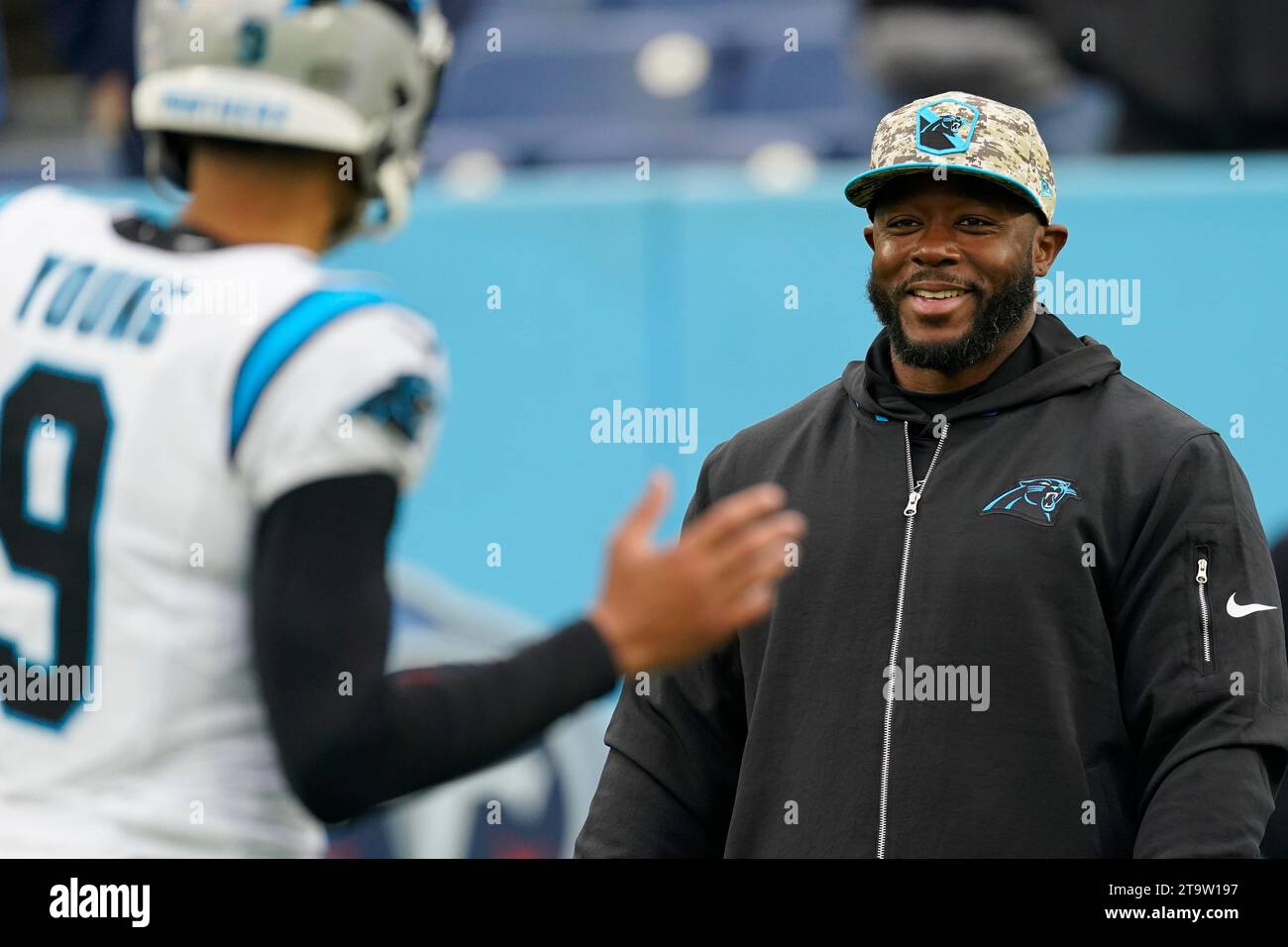 Carolina Panthers offensive coordinator Thomas Brown, right, talks to ...