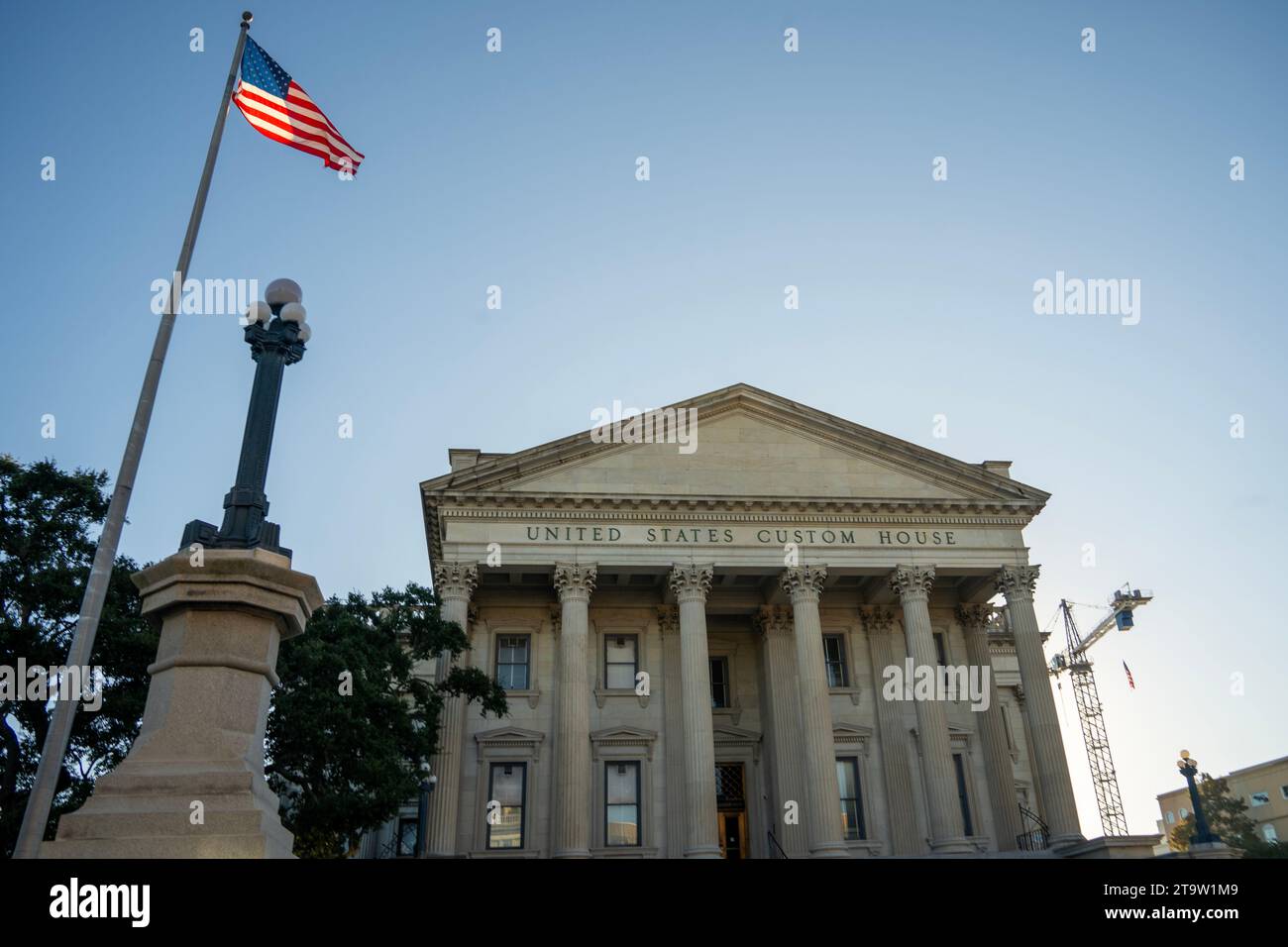 U s custom house flag flying front crane construction hi-res stock ...