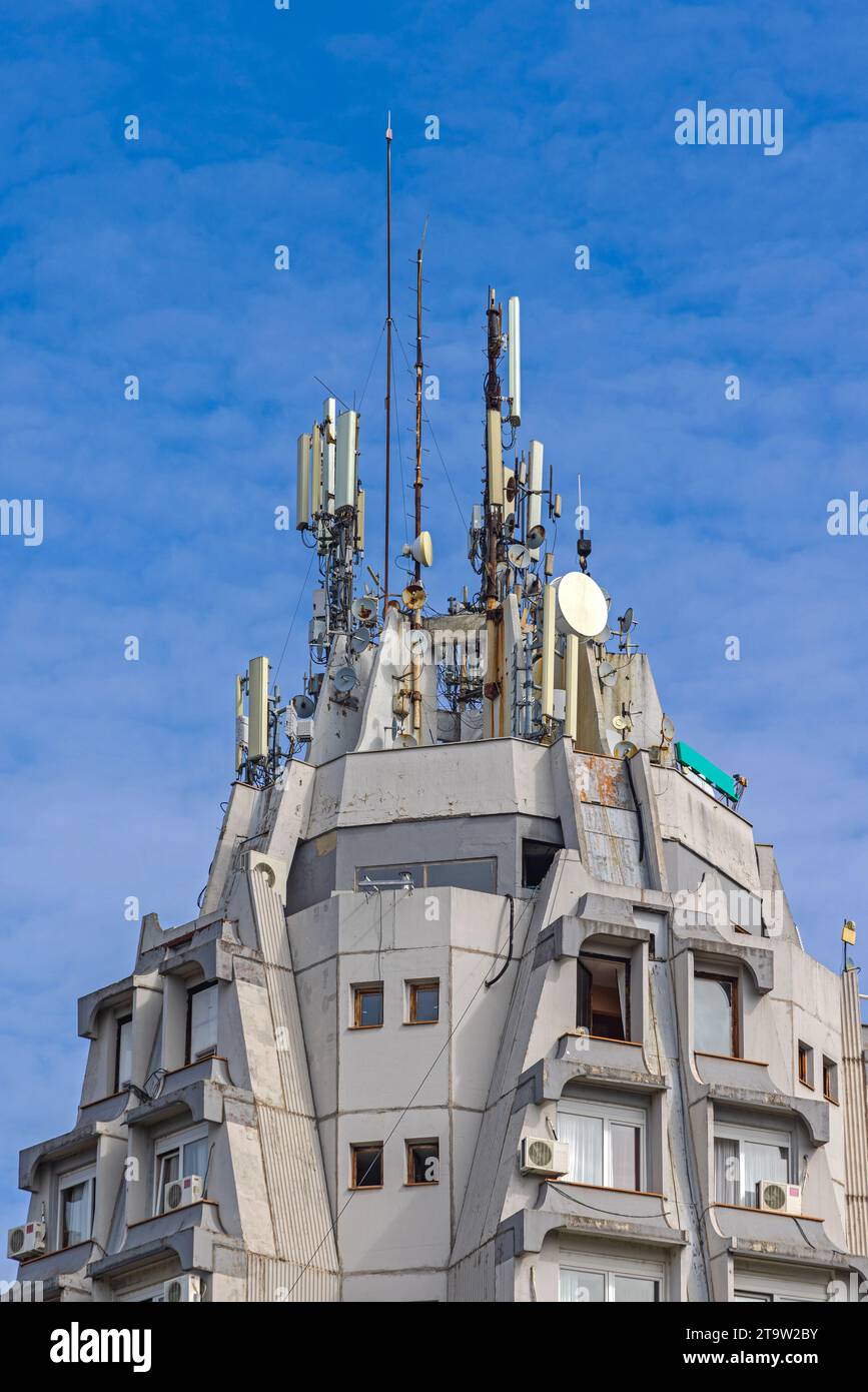 Many Communication Antennas at Top of Concrete Hotel Building in City ...