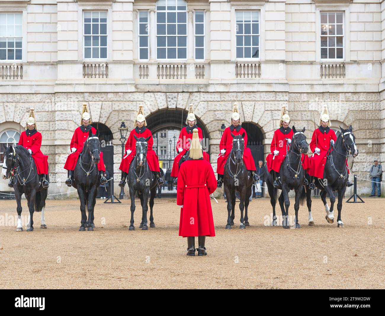 Red coated Lifeguard mounted soldiers line up on Horse Guards parade ...