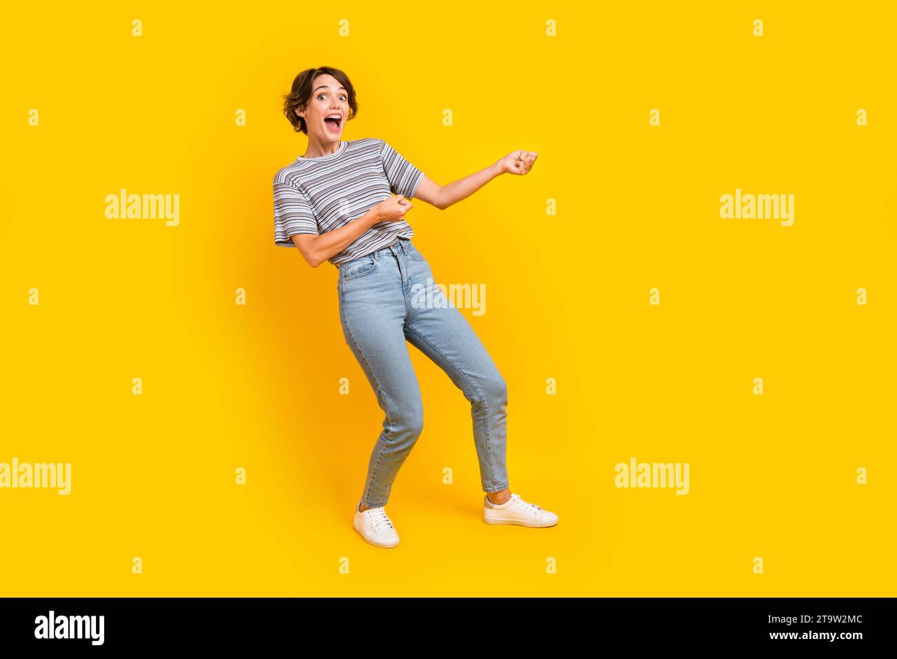 Full body profile portrait of cheerful impressed lady arms pull empty ...