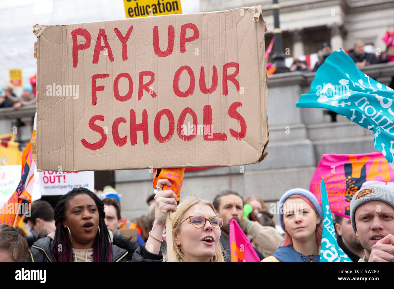 Placards are held during a march and rally called by the NEU (National ...