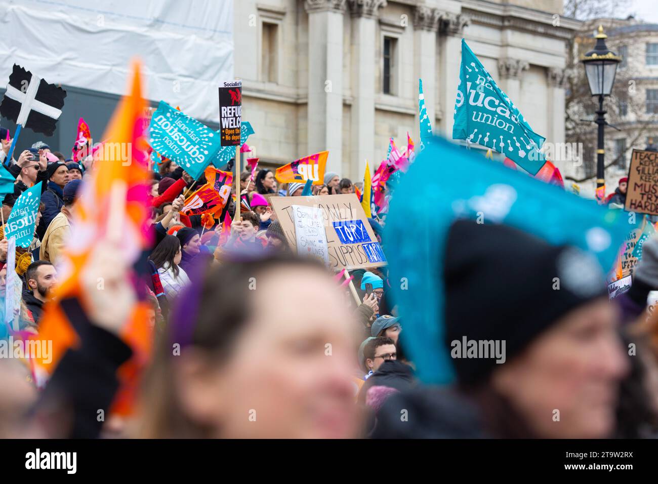 Placards are held during a march and rally called by the NEU (National ...