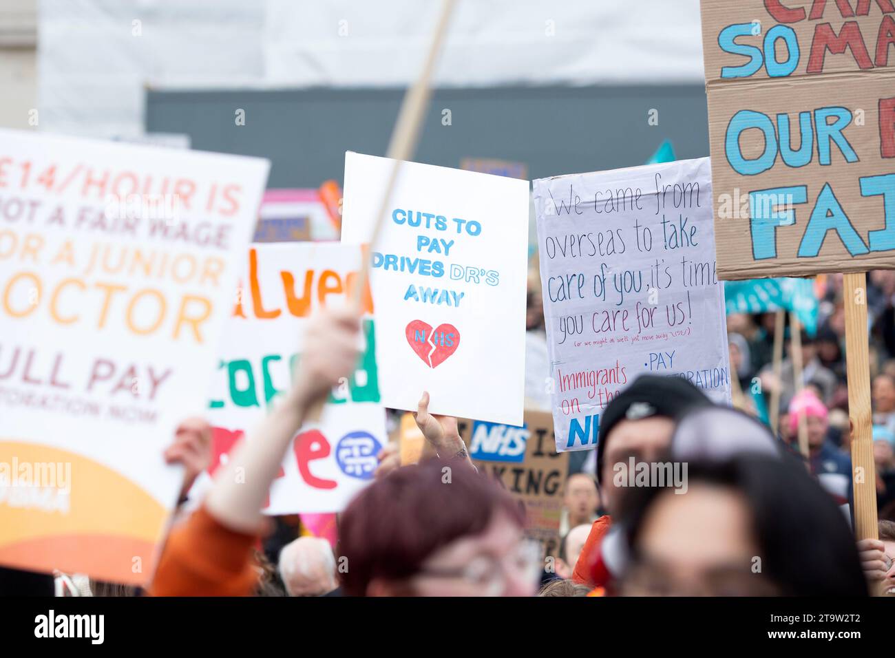 Placards are held during a march and rally called by the NEU (National ...