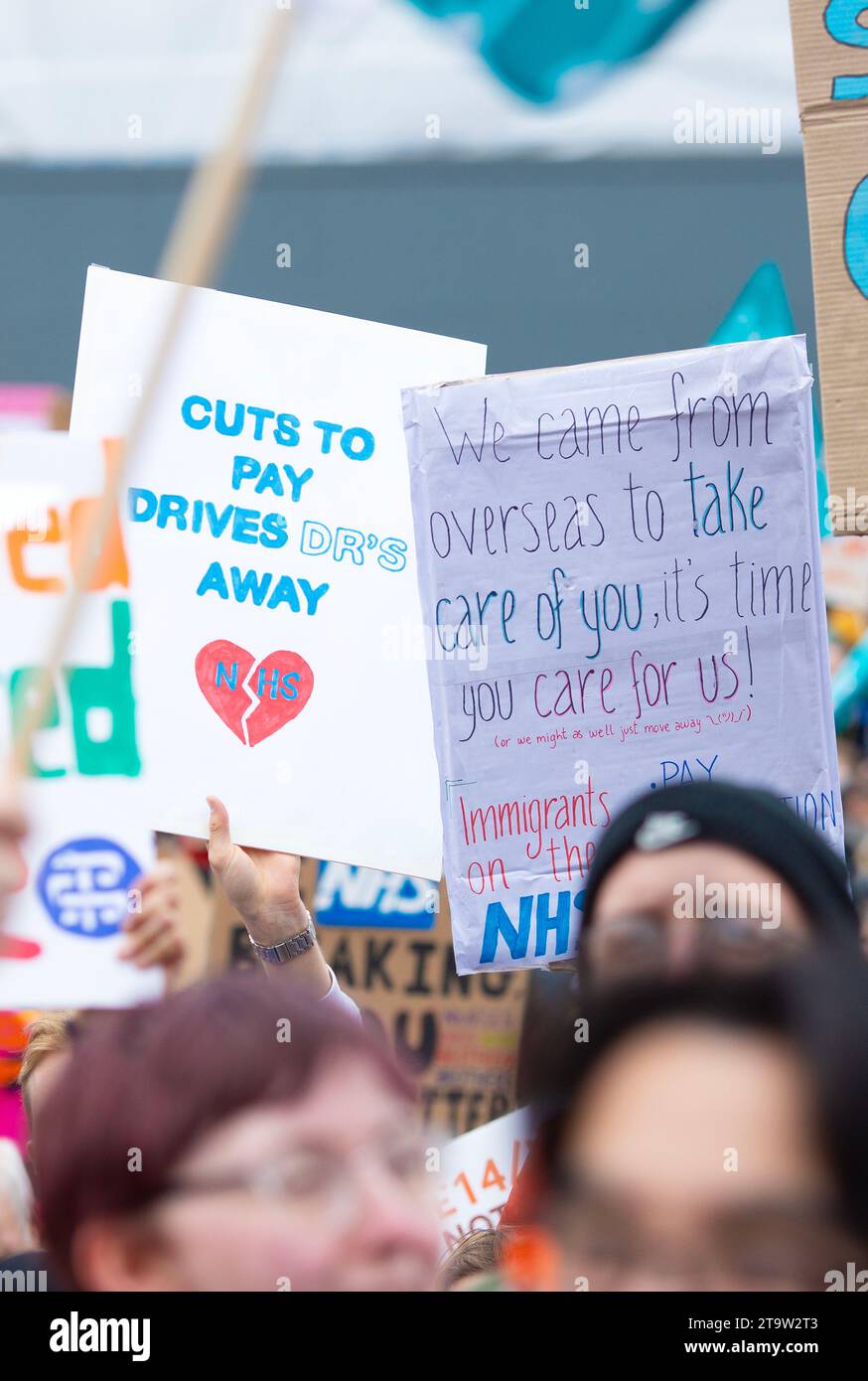 Placards are held during a march and rally called by the NEU (National ...