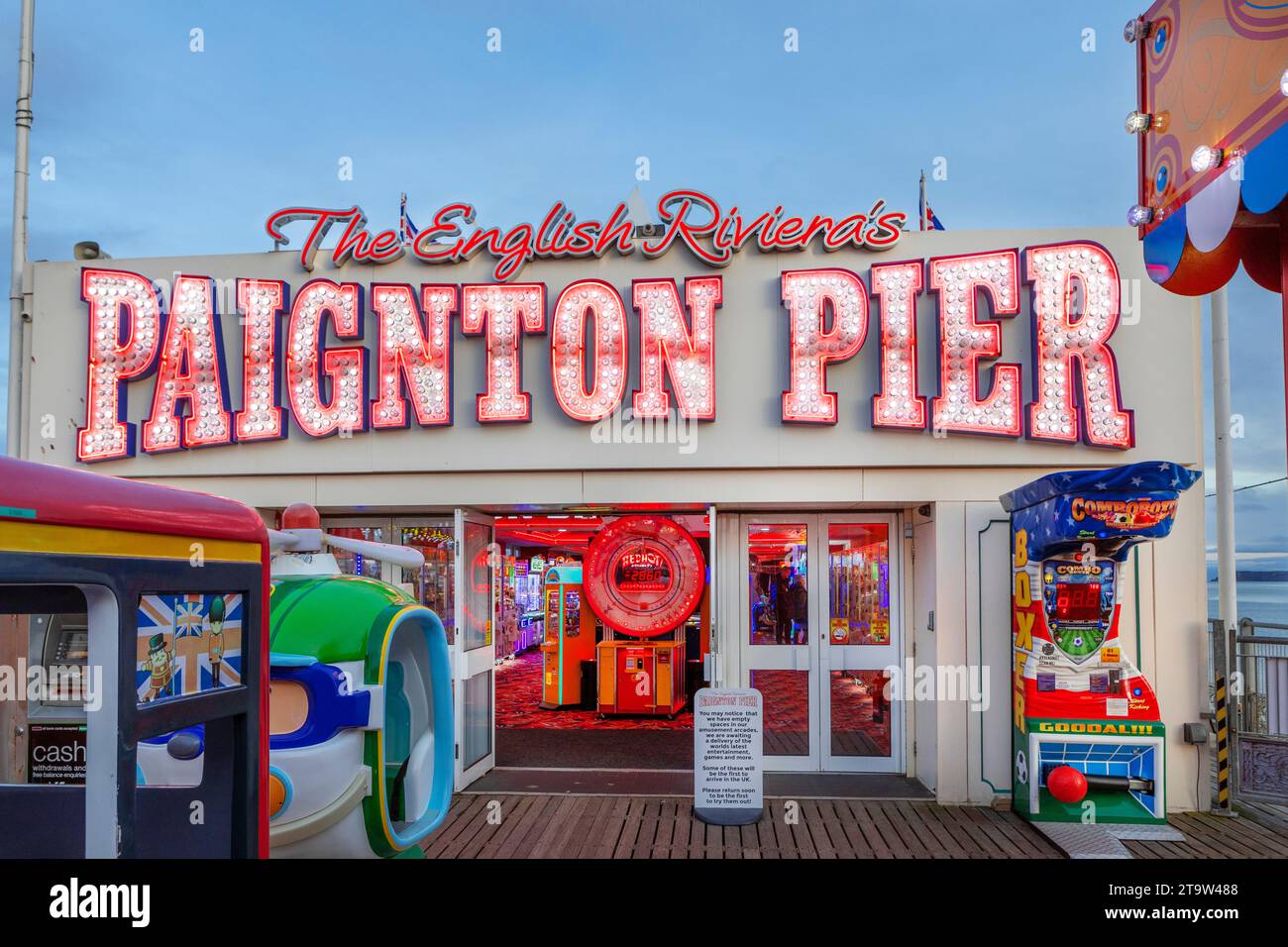 The illuminated sign and amusement arcade of Paignton Pier on the ...