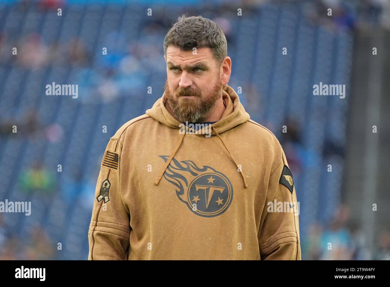 Tennessee Titans offensive coordinator Tim Kelly walks the field before ...