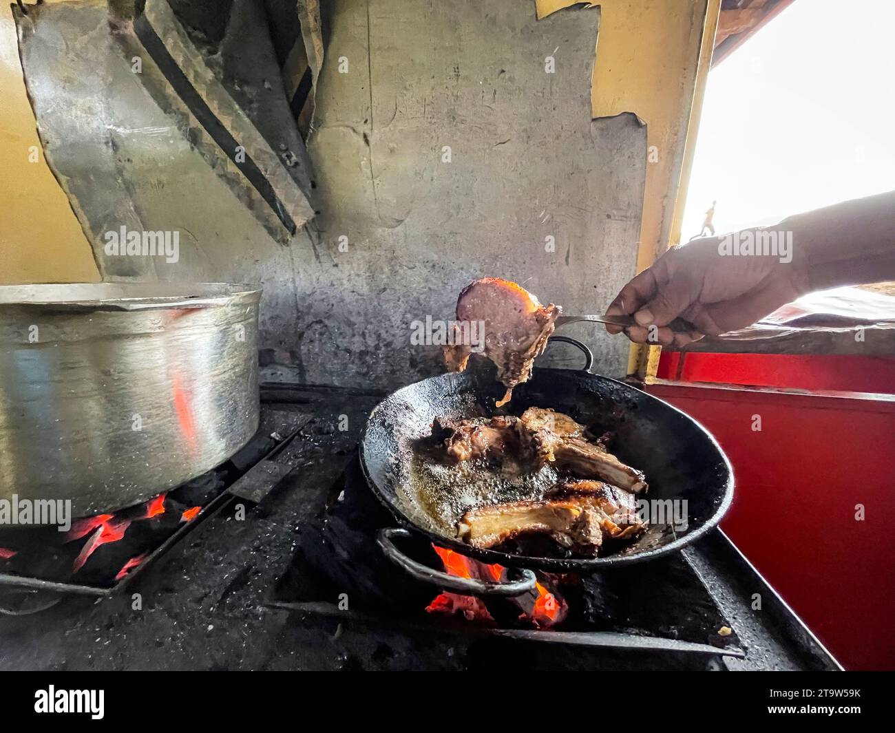 Madagascar, Tsiribihina river, cook in the kitchen of the boat Stock ...