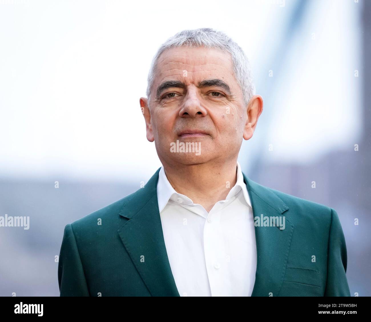 Rowan Atkinson poses for photographers upon arrival at the photo call ...