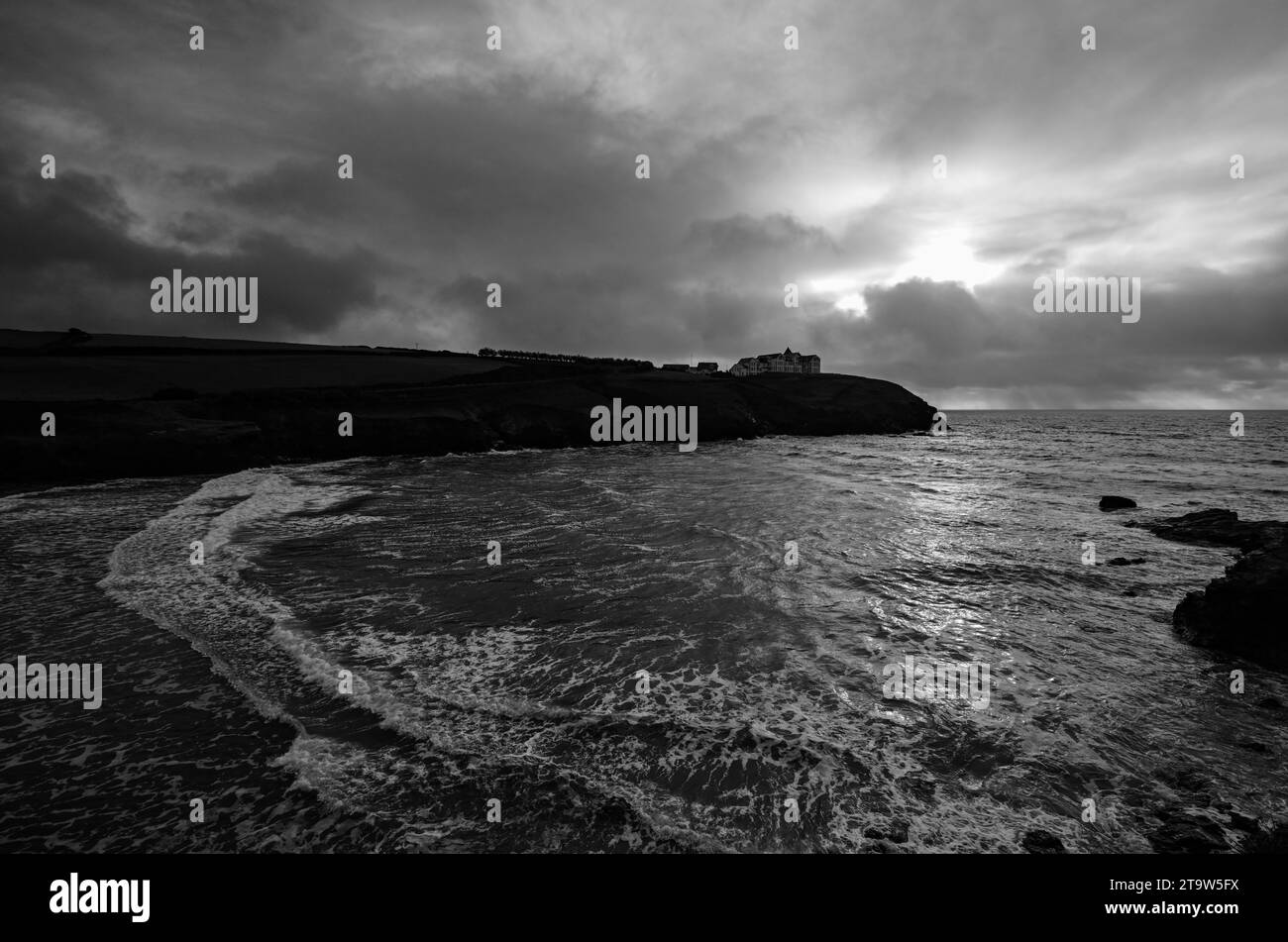 POLDHU COVE DARK DRAMATIC STORMY SKIES WITH POLDHU HOTEL AND HEADLAND ...