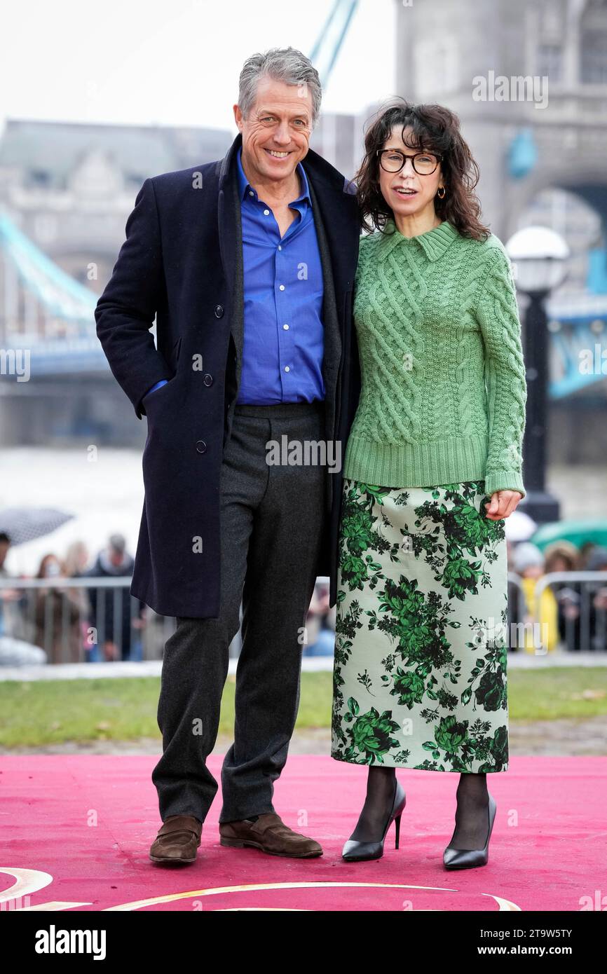 Hugh Grant, left, and Sally Hawkins pose for photographers upon arrival at the photo call of the ...