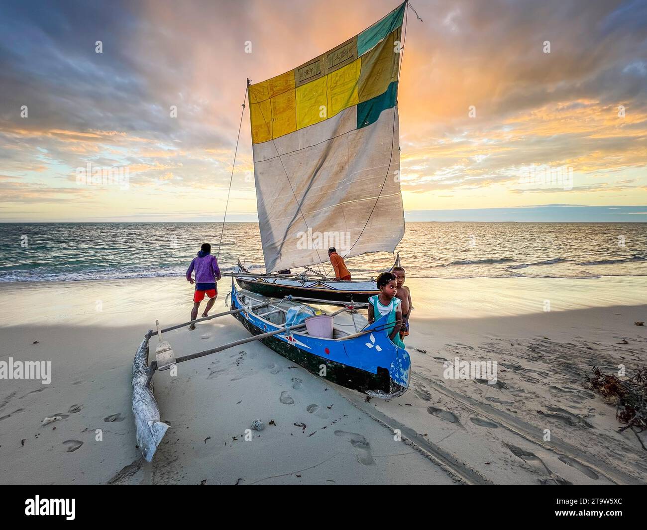 Madagascar, traditional boat at sunset Stock Photo - Alamy