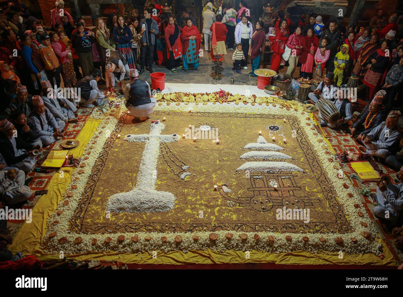 Bhaktapur, Bagmati, Nepal. 27th Nov, 2023. Devotees make figures of ...