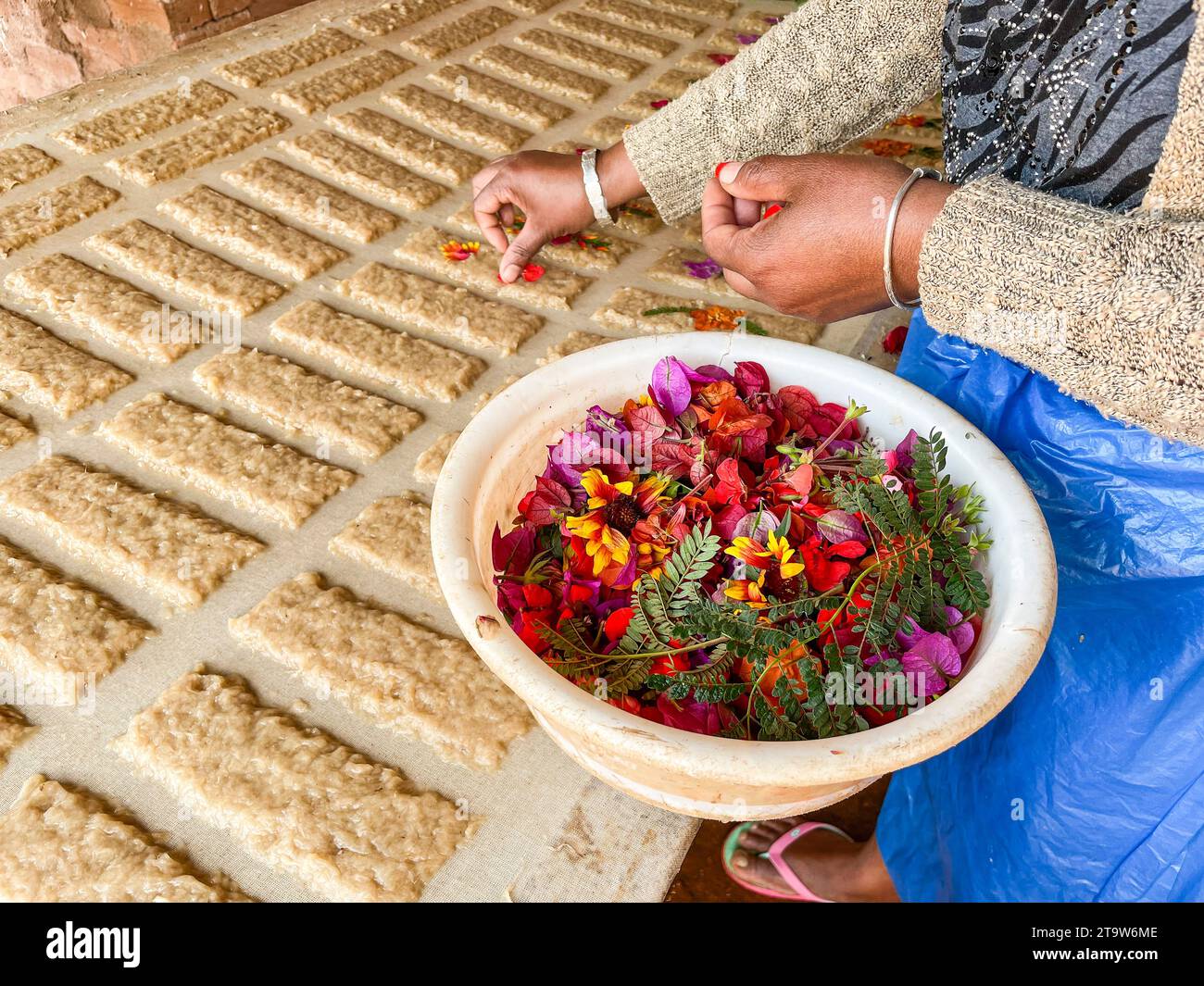 Madagascar, Ambalavao, Antemoro Paper factory, craftswoman works paper ...
