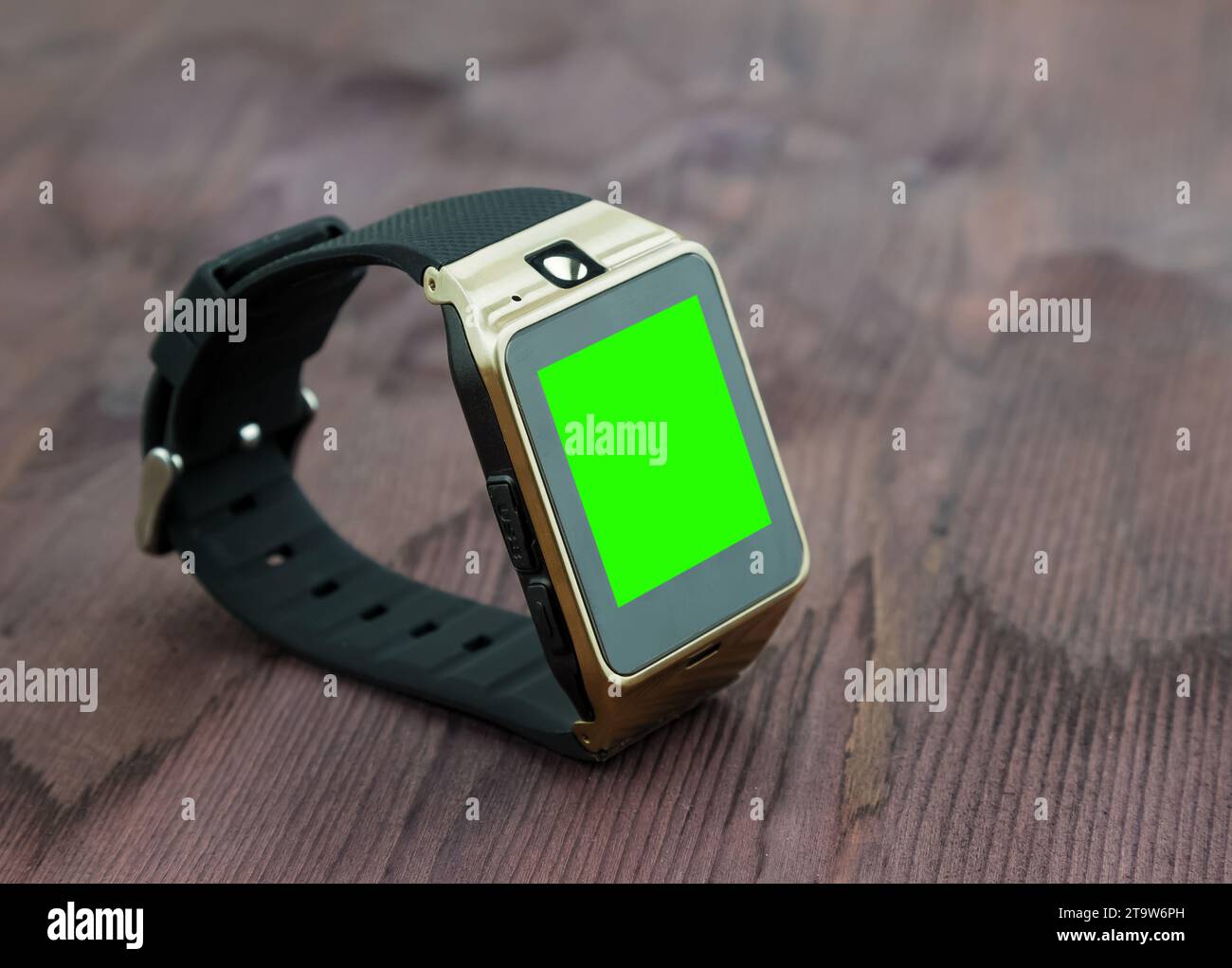 smartwatch isolated on wood background with chroma key green screen ...