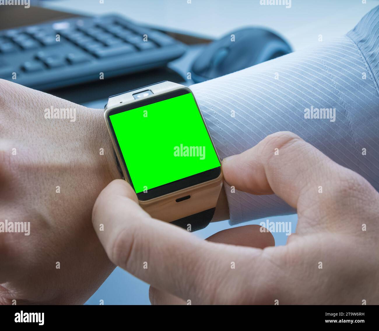 business man using smartwatch app with chroma key green screen near ...