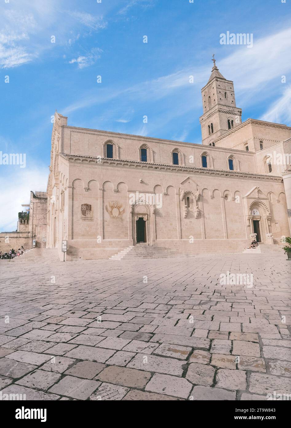 view of typical church of Matera, Cathedral of Matera under blue sky ...
