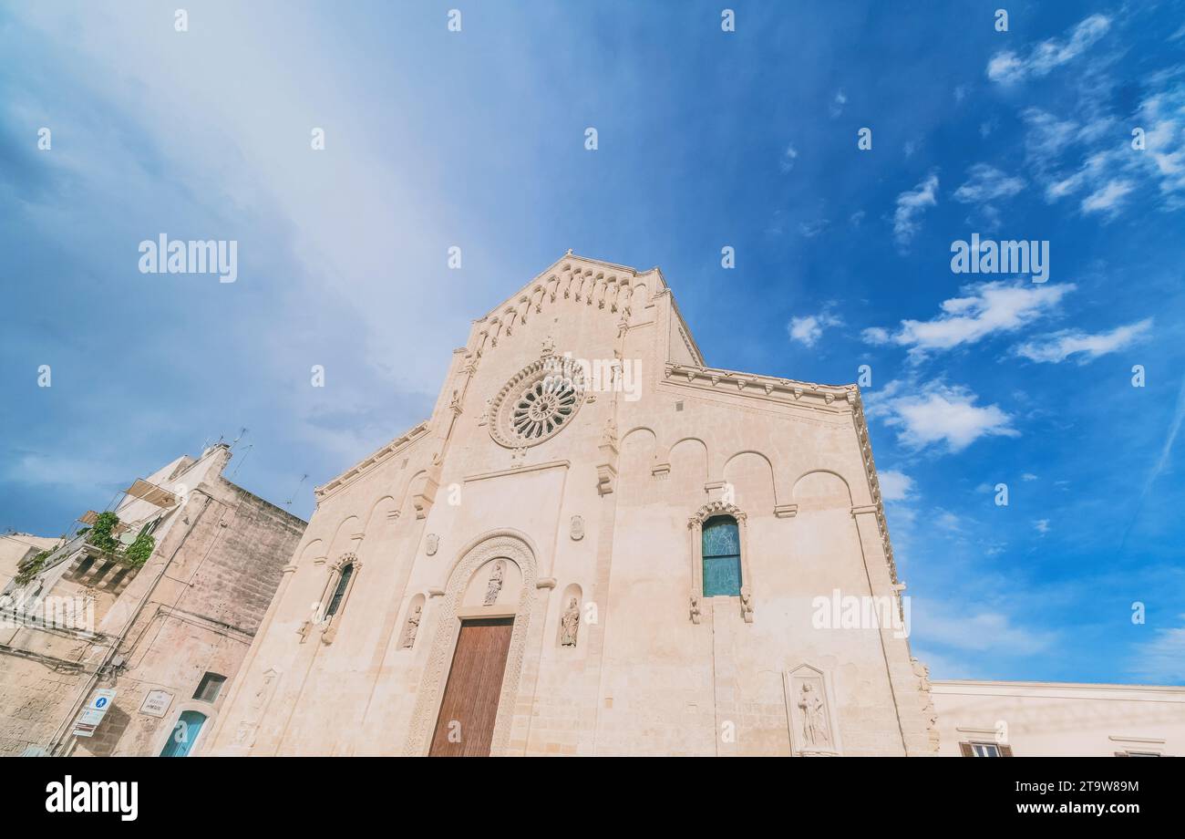view of typical church of Matera, Cathedral of Matera under blue sky ...
