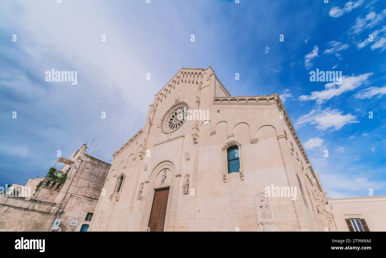 view of typical church of Matera, Cathedral of Matera under blue sky ...