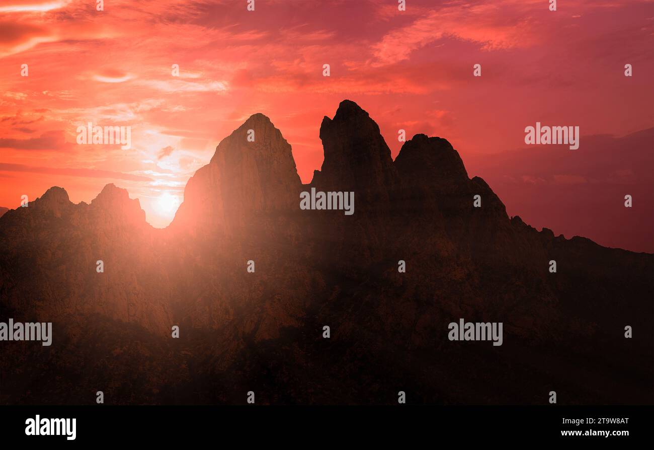 mountains silhouette at sunset scene with sun fall and ray light ...