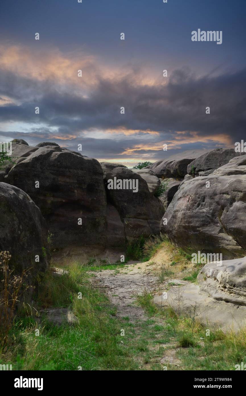 Rocks with an angry sky Stock Photo - Alamy