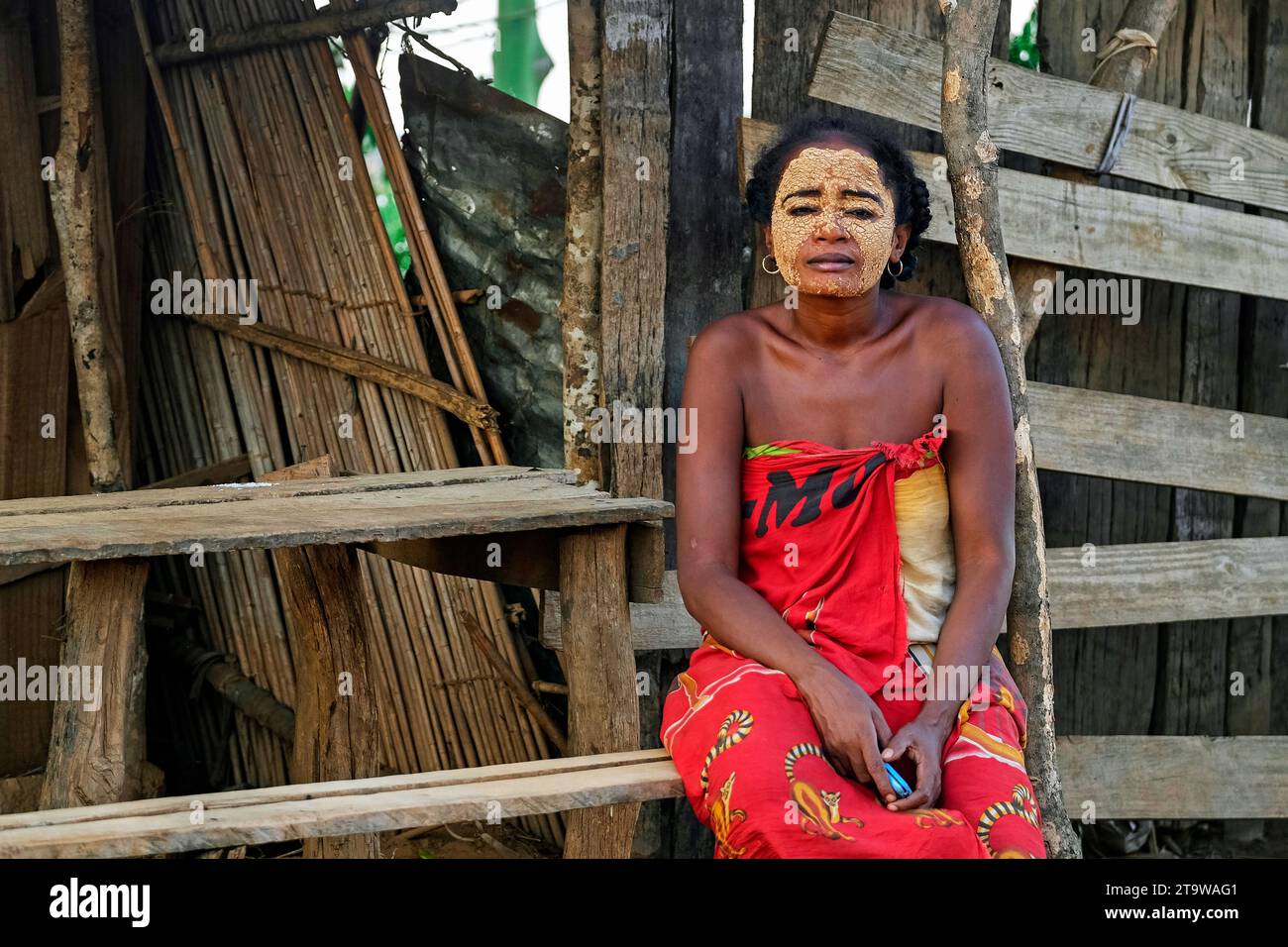 Malagasy woman with sun protection mask made from Musiro root at ...