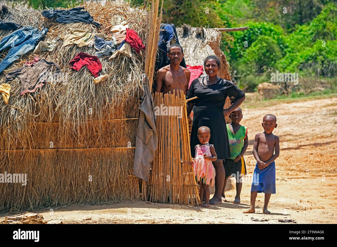Malagasy family with children posing at their hut at Begidro near ...
