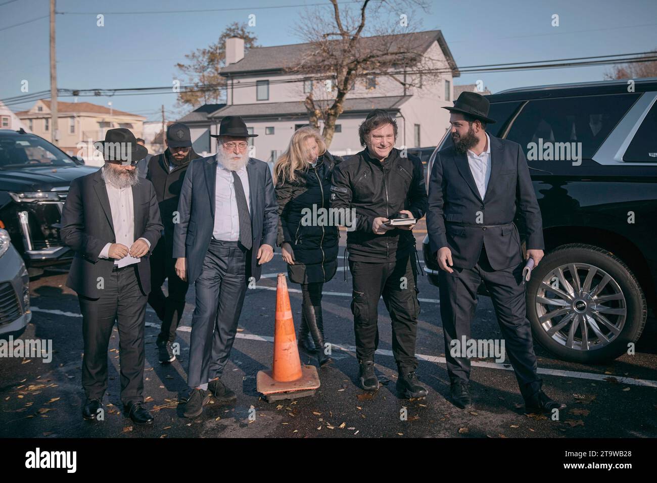 Argentina's President-elect, Javier Milei, second right, arrives to ...