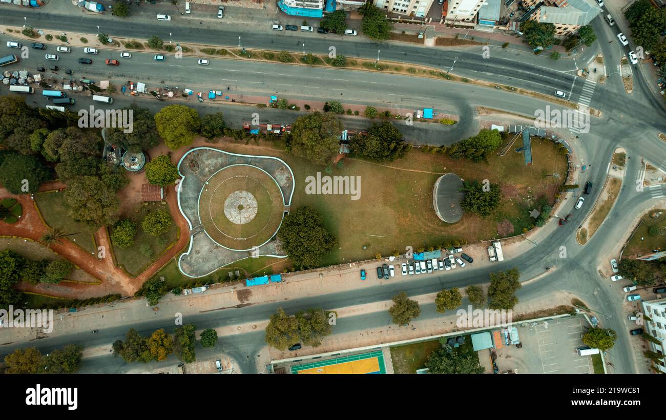 Aerial view of an urban roundabout in the center of a busy city ...