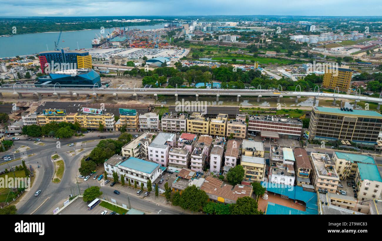 A bird's eye view of a bustling metropolitan area reveals a densely ...