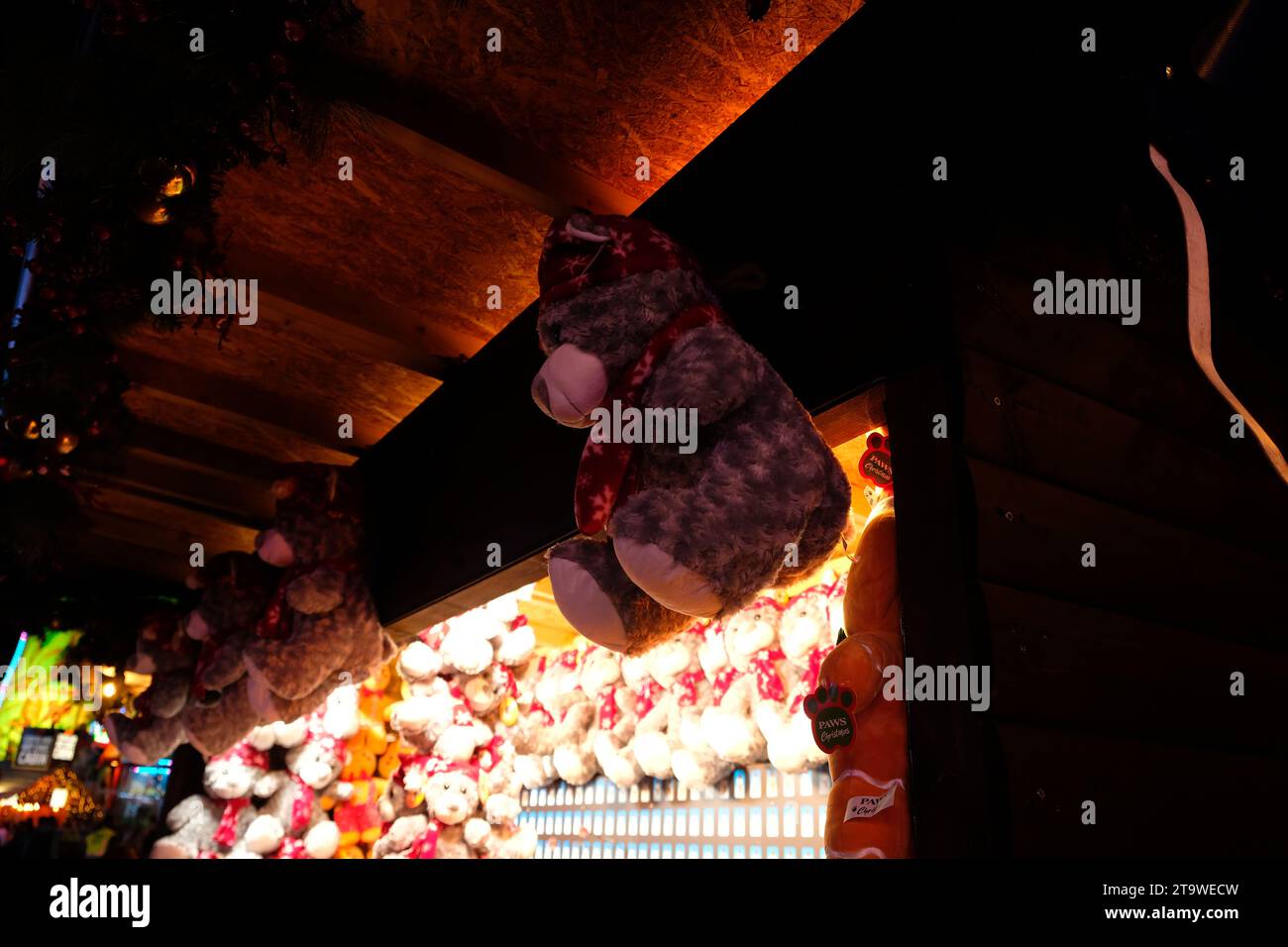 Teddy bear hanged on shooting game at theme park Stock Photo - Alamy