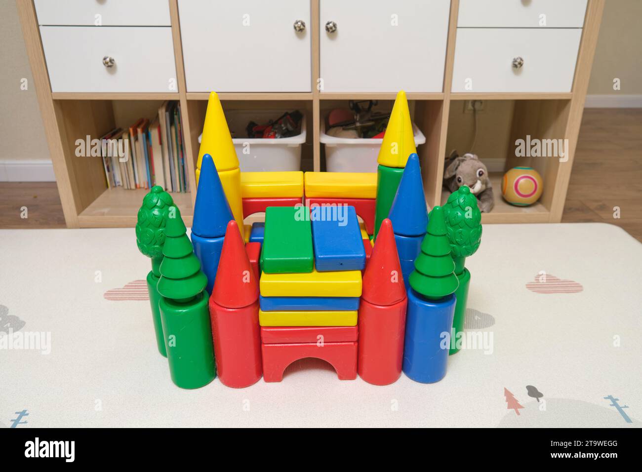 Construction of a children's building from designer cubes on the ...