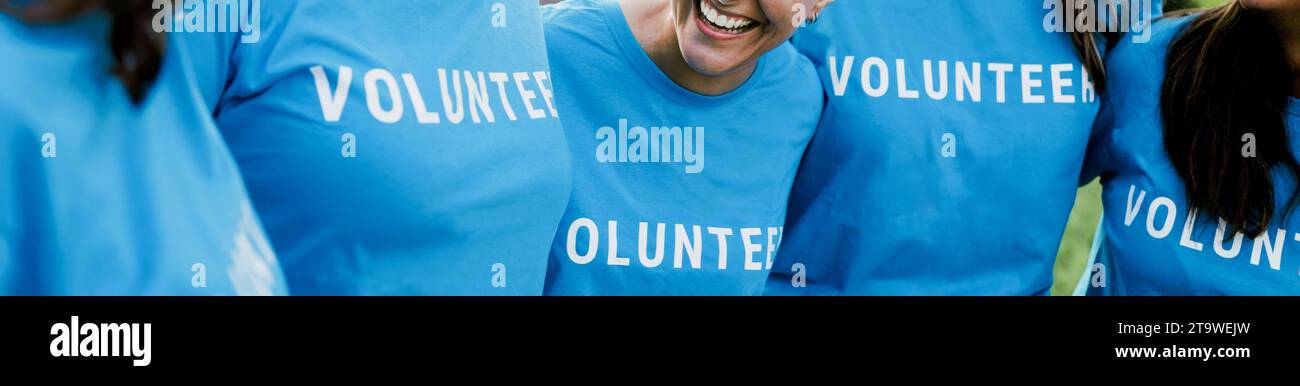 Happy group of volunteer people celebrating together outdoors. Teamwork ...