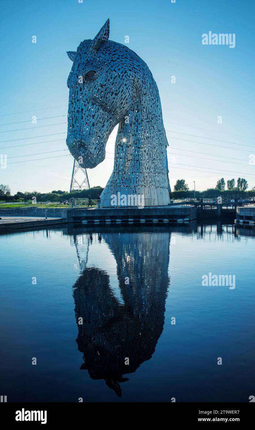 Single Kelpie sculpture reflected in water,30-metre-high (98 ft ...