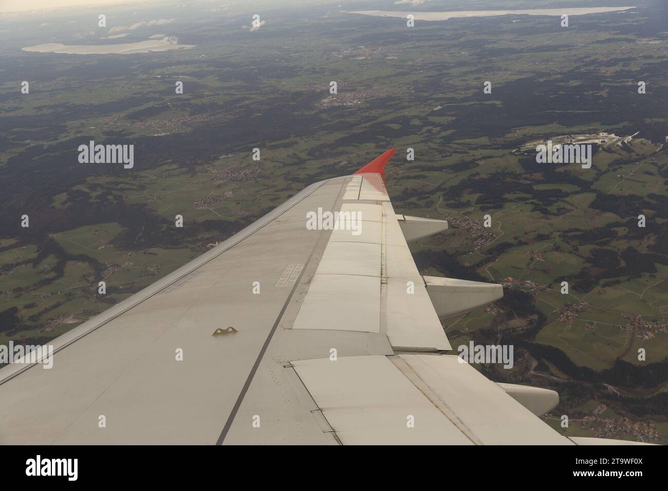 Airplane wing during flight Stock Photo - Alamy