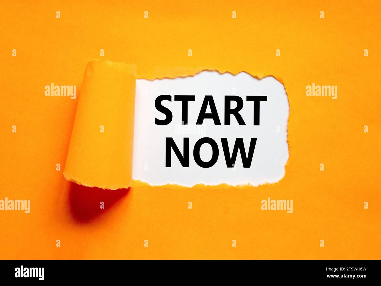 Start now symbol. Concept words Start now on beautiful white paper ...