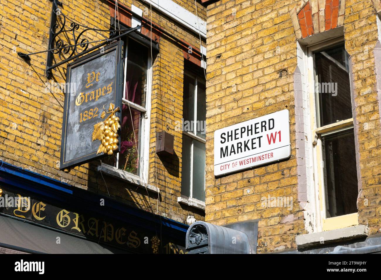 Street sign for the 18th-century square Shepherd Market and Ye Grapes ...