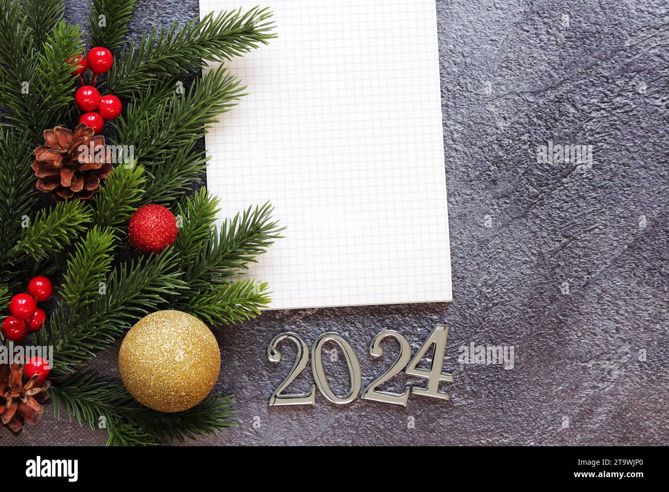 Happy New Year 2024, gray background with fir branch and notepad New ...