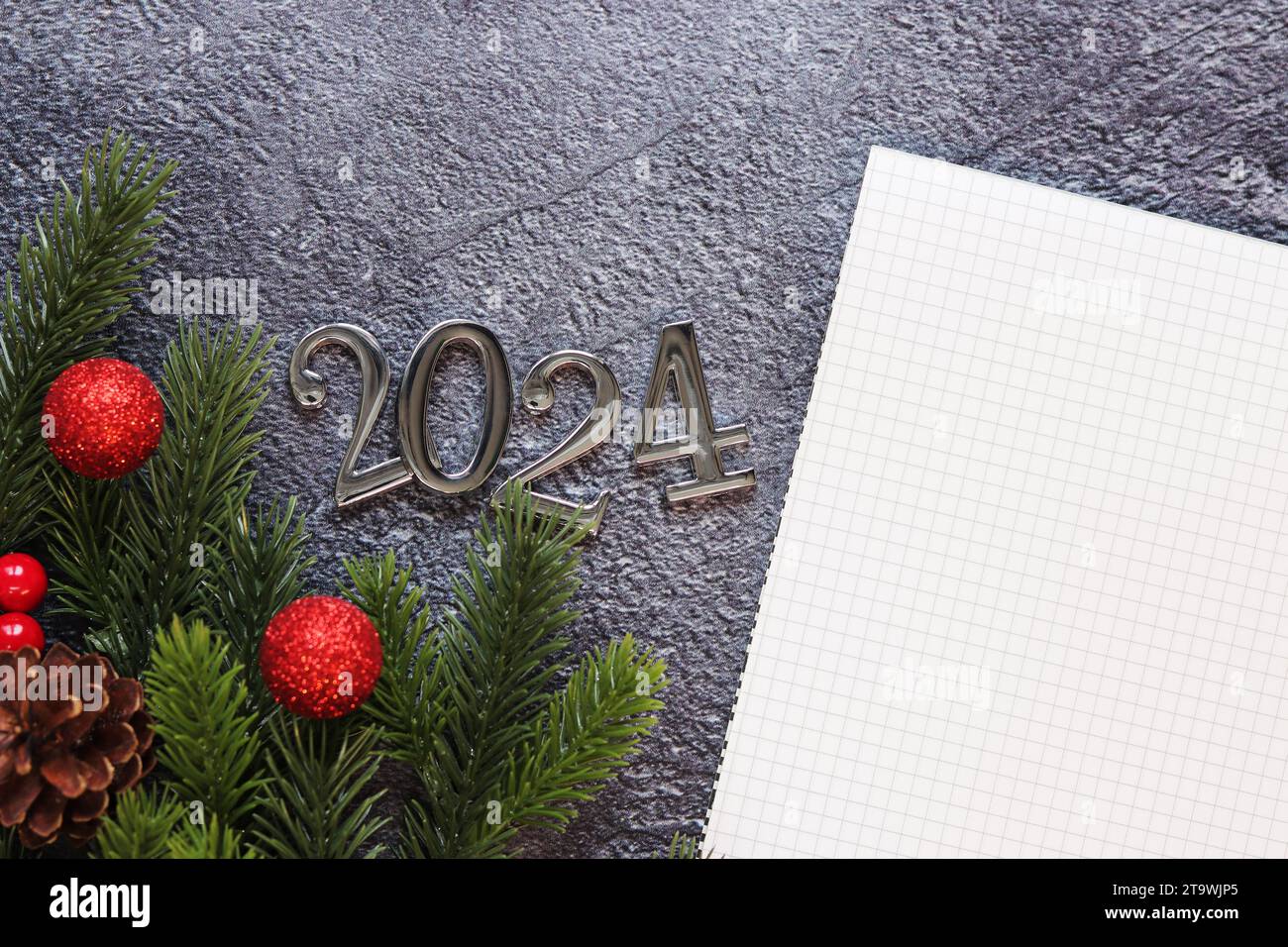 Happy New Year 2024, gray background with fir branch and notepad New ...