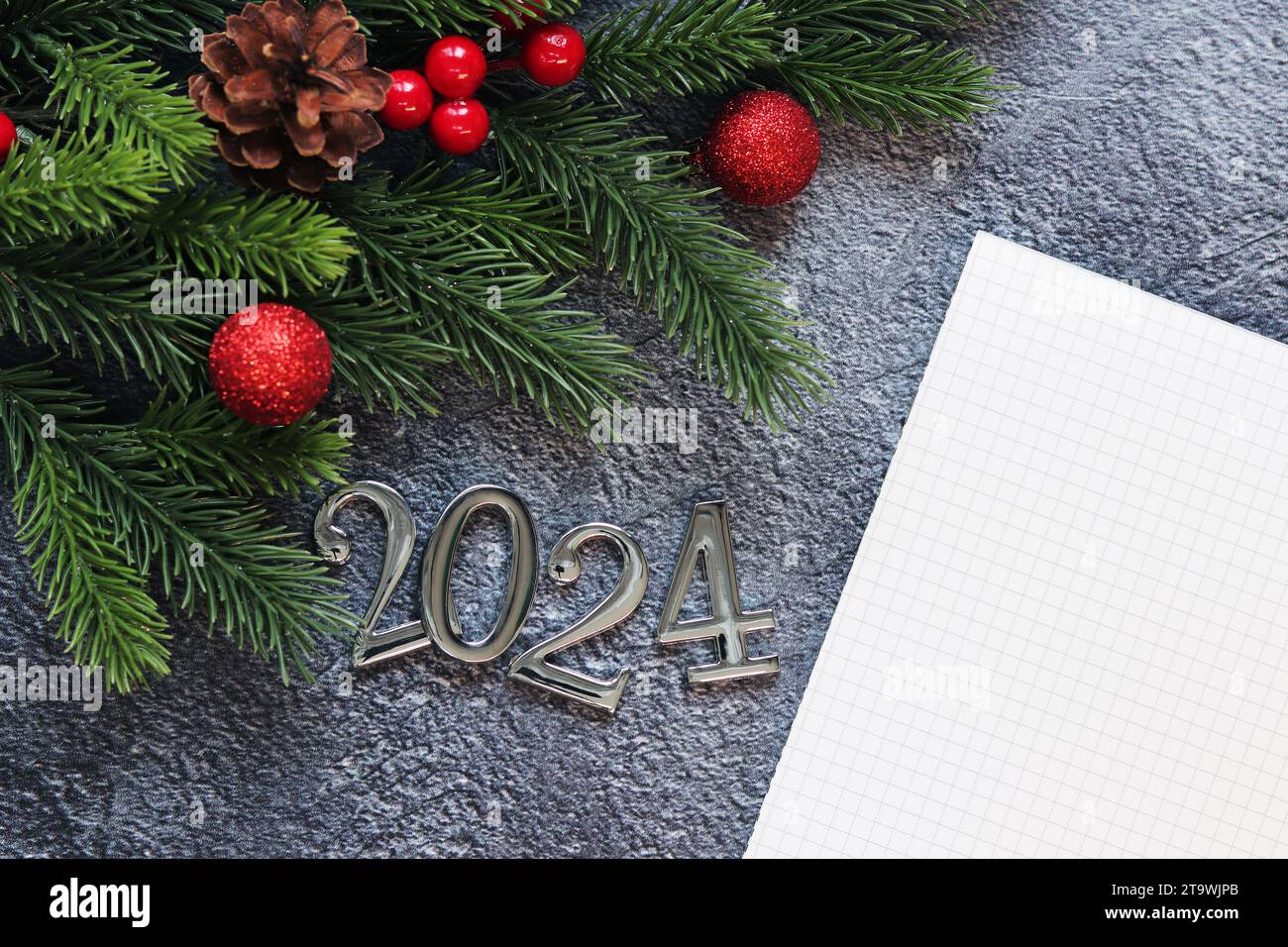 Happy New Year 2024, gray background with fir branch and notepad New ...