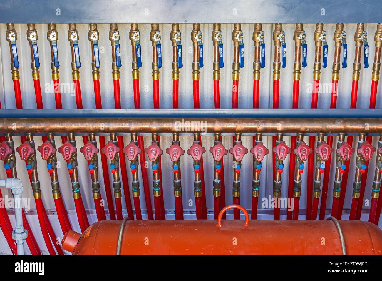 Hoses and valves for floor warming from up on roof in a newly ...