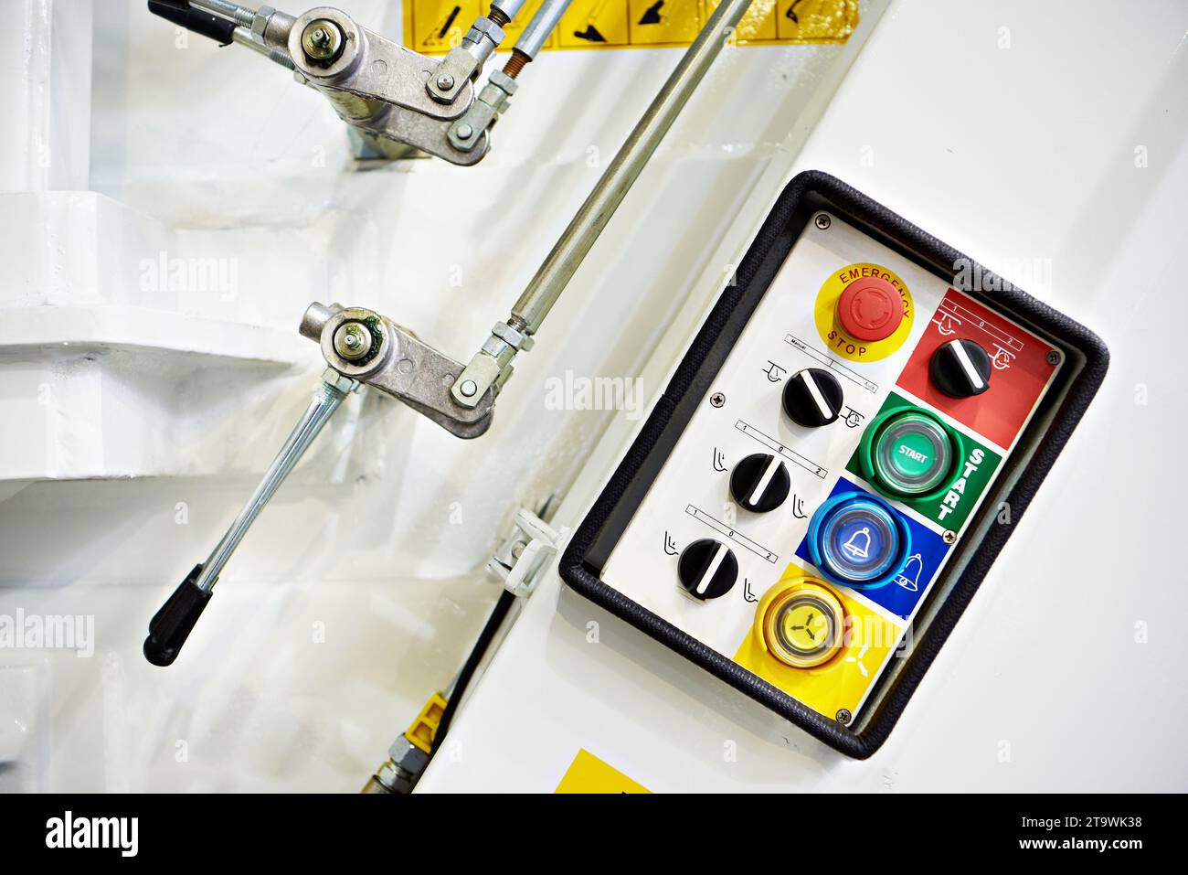 Buttons and levers of the control panel of the white garbage truck ...