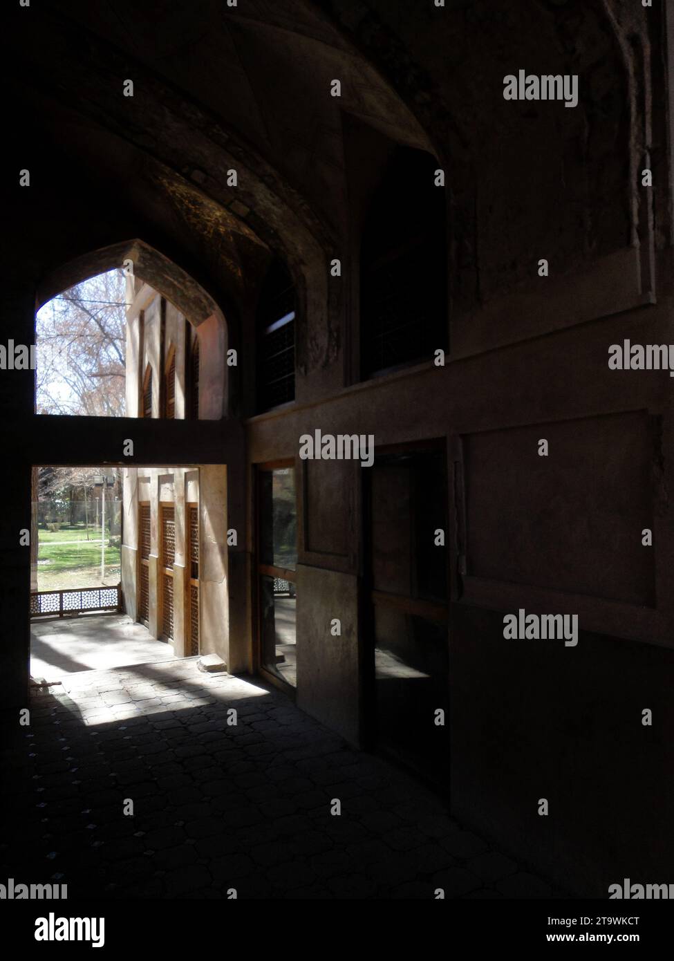 The Hasht Behesht Palace is illuminated by sun rays streaming down from ...