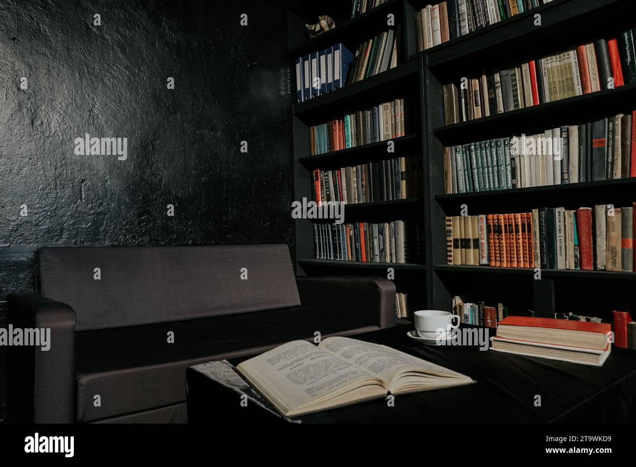 library with books black Office with table Stock Photo - Alamy