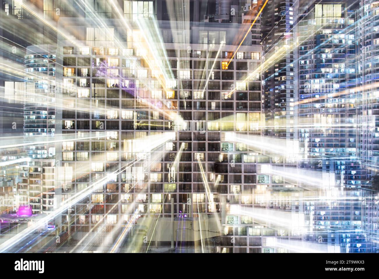 Night scene of architectural abstract patterns lights converging toward ...